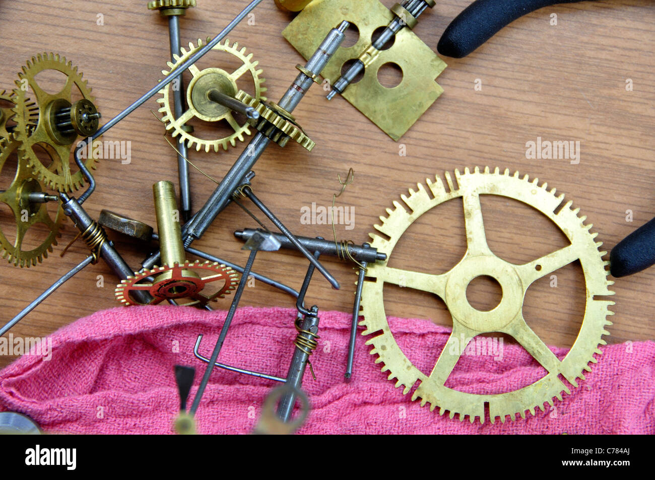 Workbench of a clock repairman Stock Photo - Alamy