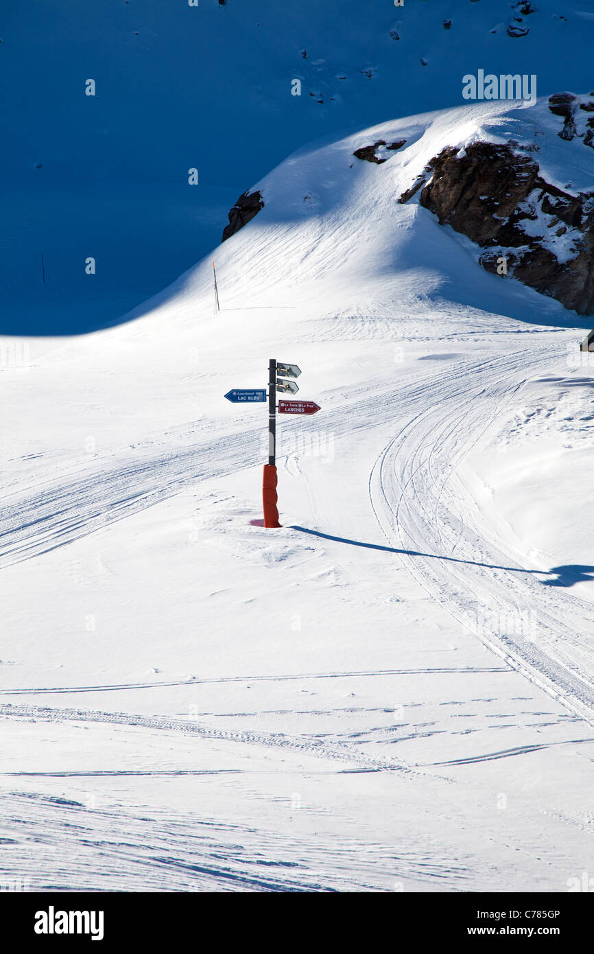 Signpost showing ski routes between Courchevel and Meribel, Courchevel ...