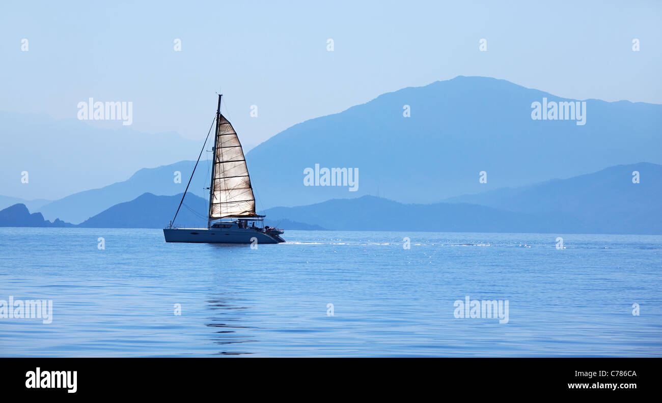 Sailboat at open sea, beautiful nature, blue color landscape Stock ...