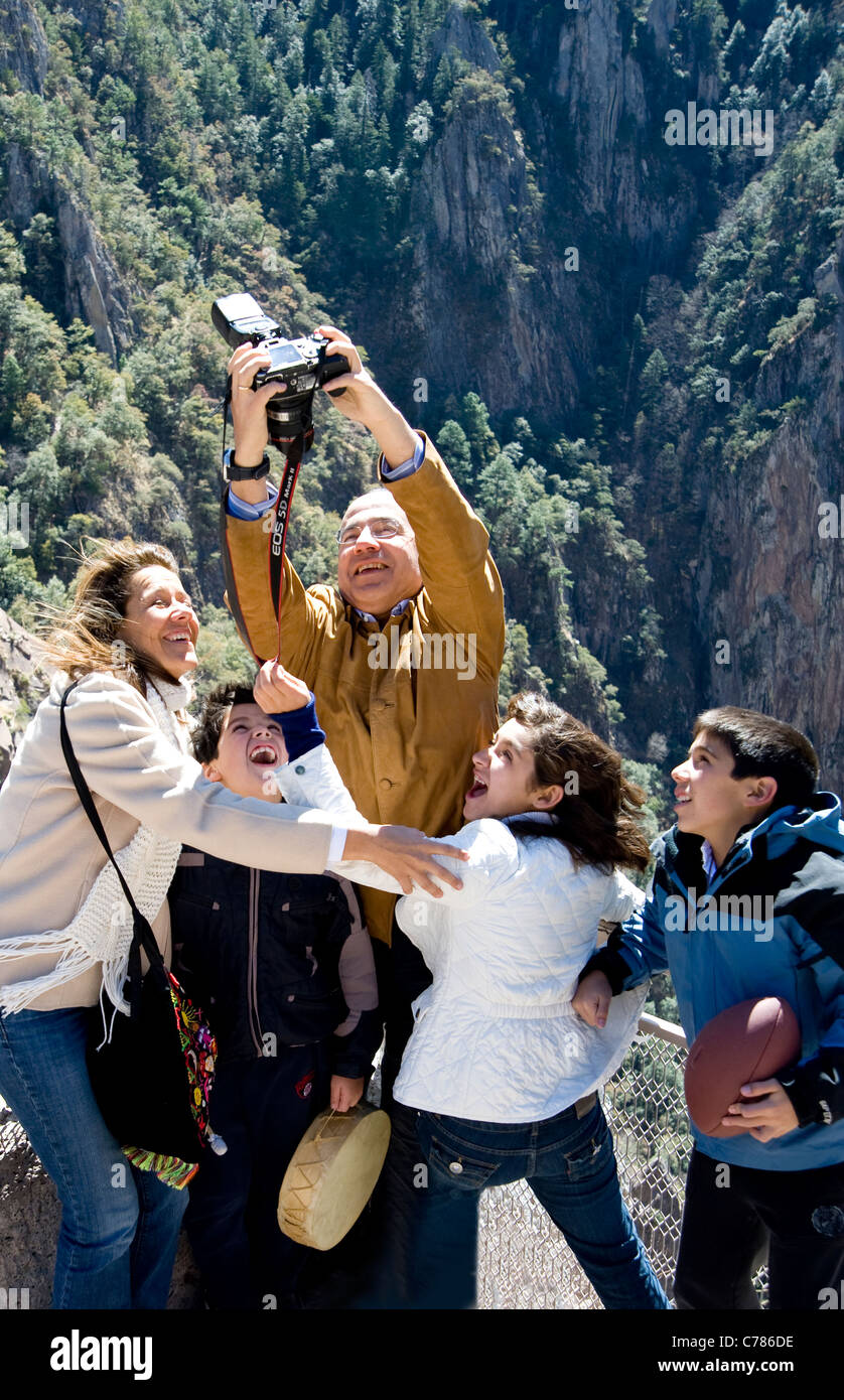 President Feliipe Calderon takes a photo of his family at the rim of ...