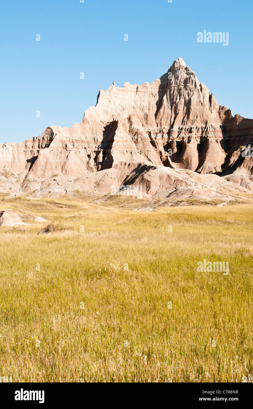 Sculpted spires rise above prairie grasslands in Badlands National Park ...