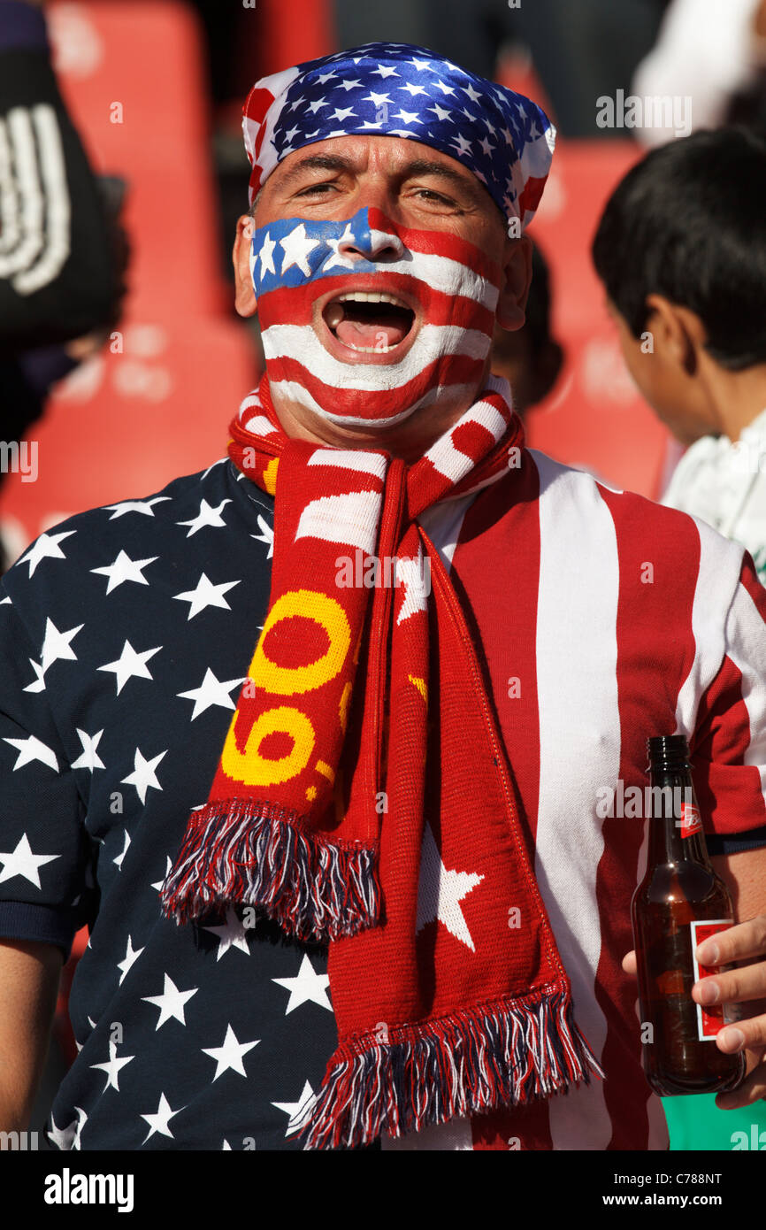 A USA supporter in the stands cheers at a FIFA World Cup match between ...