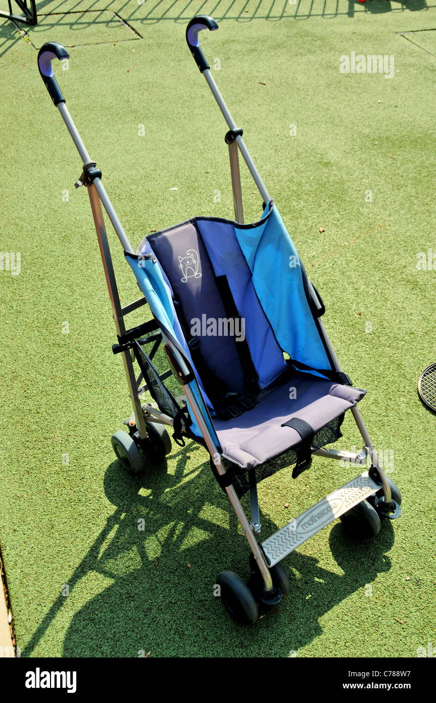 Pushchair baby buggy abandoned empty sad lonely Stock Photo - Alamy