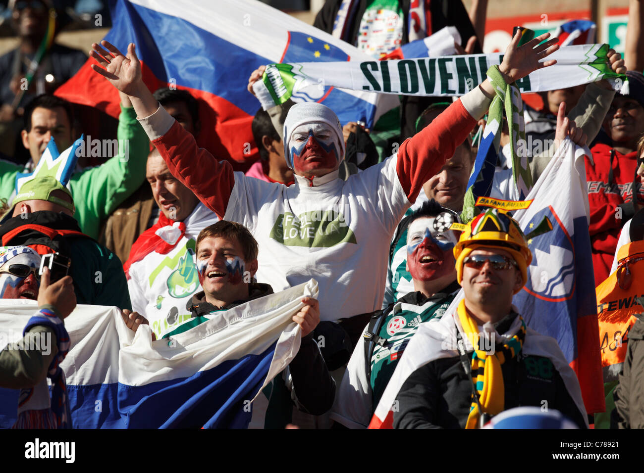 Football fan in the stands face in the crowd hi-res stock photography ...