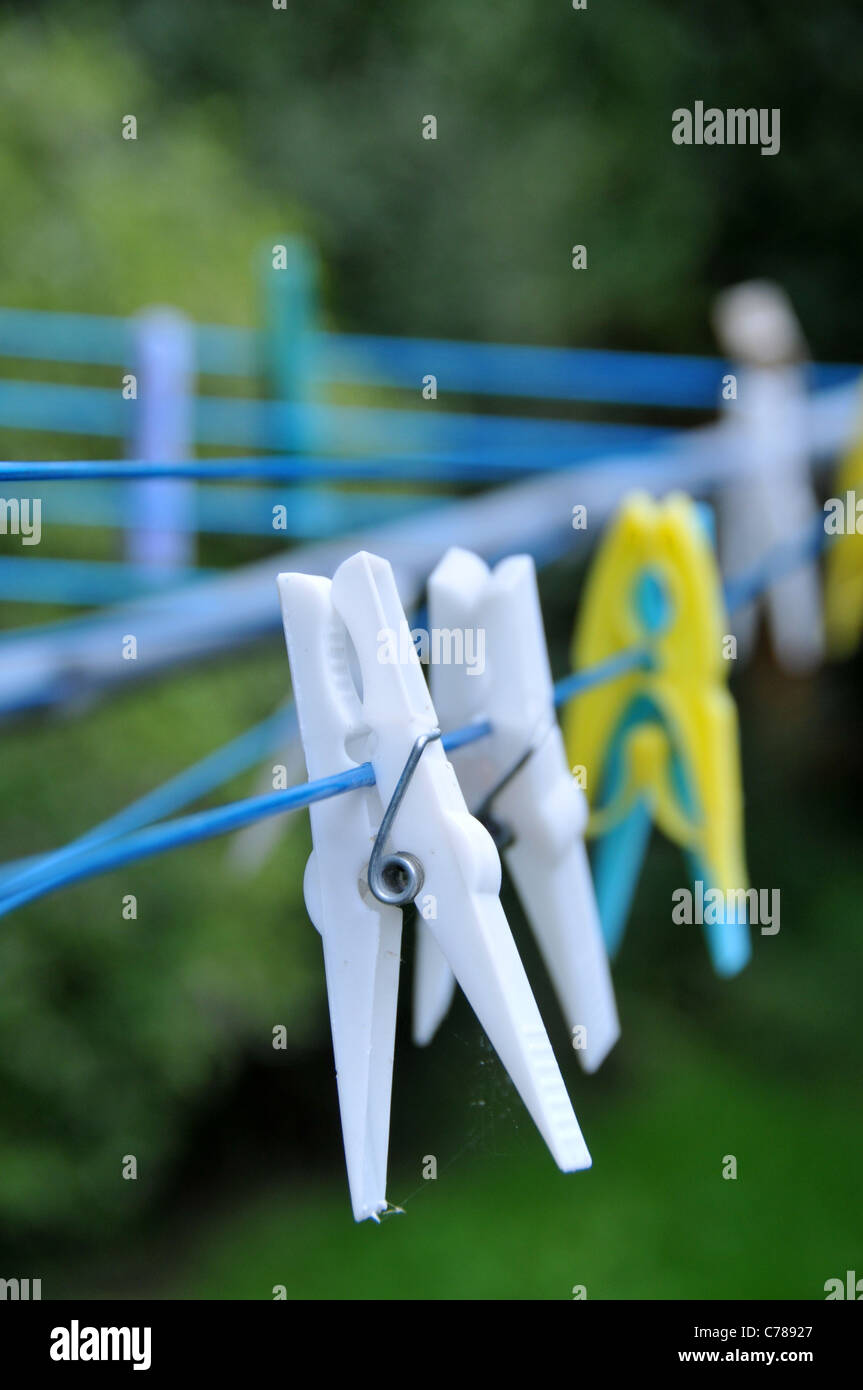 Clothes pegs washing line out of focus plastic bright colours Stock ...