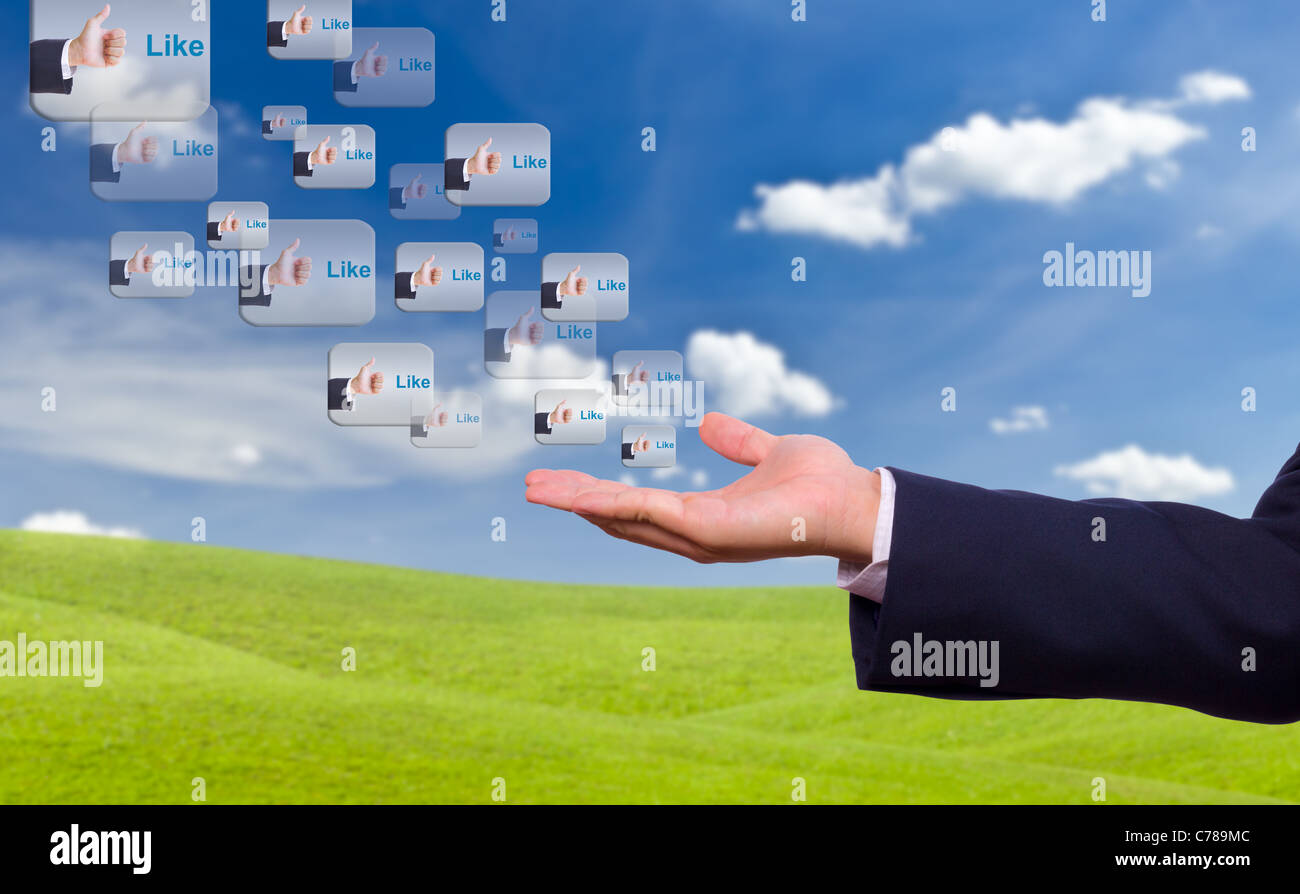 hand and like buttons Stock Photo - Alamy