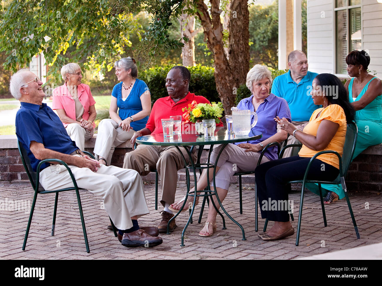 Senior citizens chat at a senior citizen center Stock Photo - Alamy