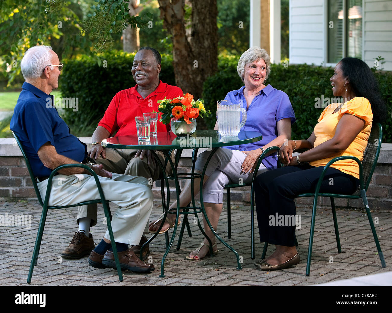 Senior citizens chat at a senior citizen center Stock Photo - Alamy