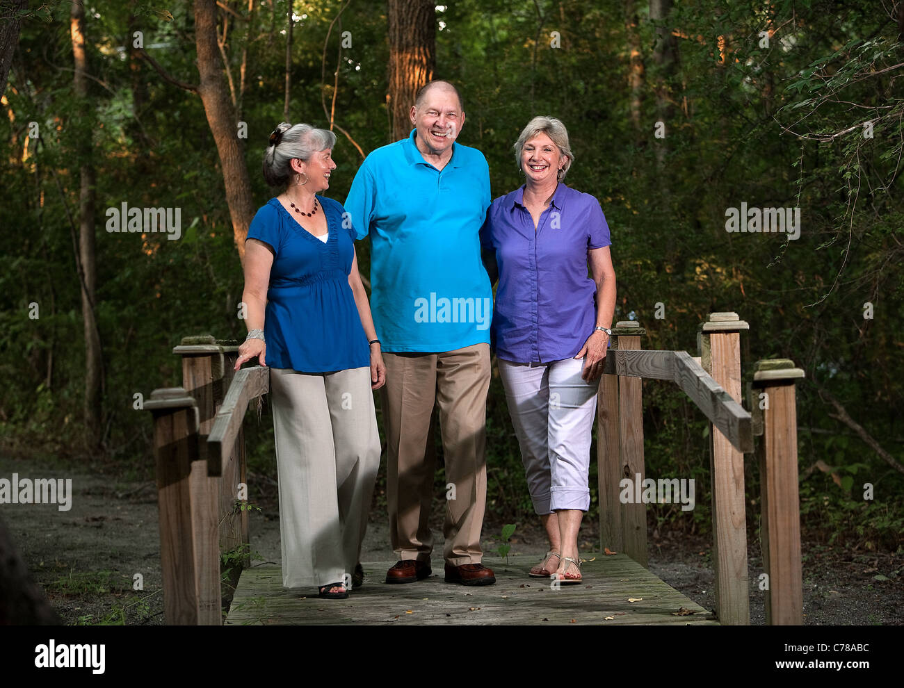 Senior Citizens walk in a park Stock Photo - Alamy