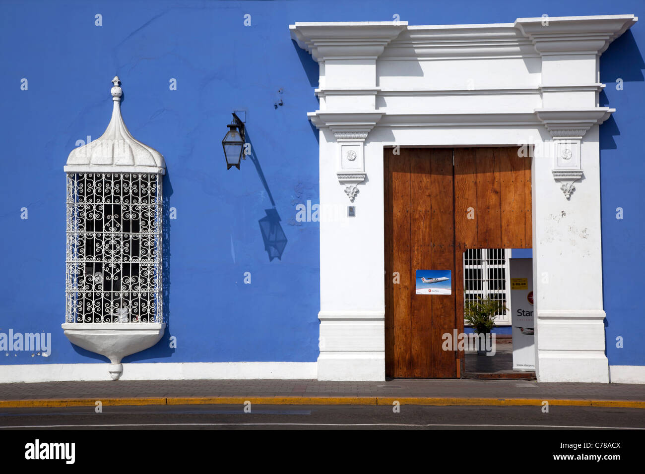 Brightly painted colonial era buildings that front Trujillo', Peru's ...