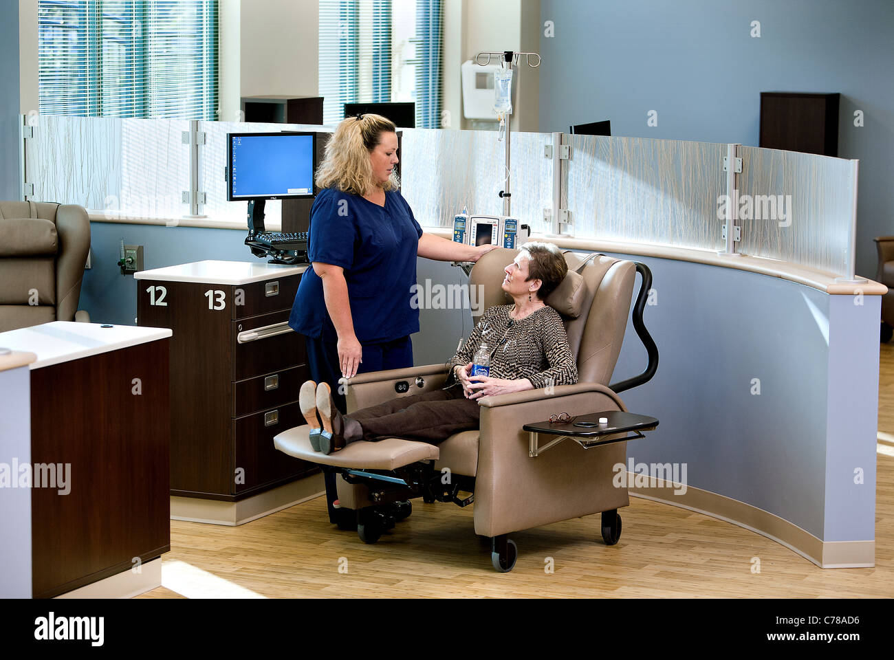 Nurse and patient in cancer infusion area. Chemo treatment Stock Photo ...