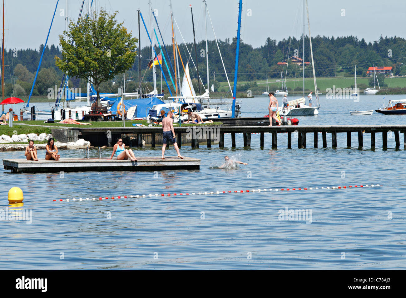 Summer holidays at the outside swimming area of Prienavera, Prien Stock ...