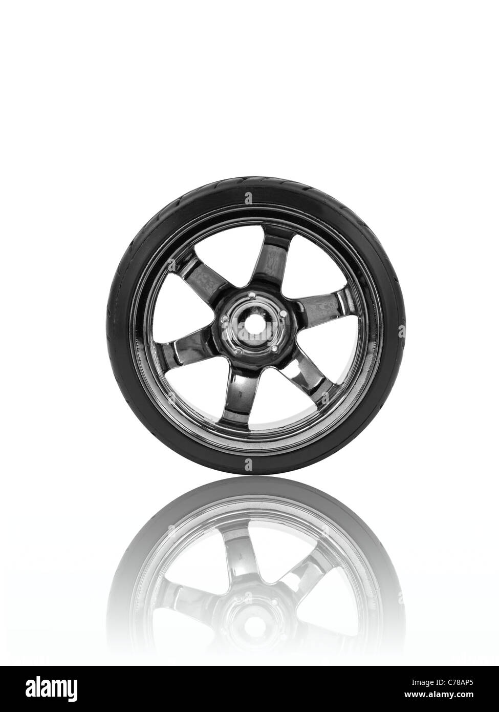 Rubber tyres with sports rims on a white background Stock Photo - Alamy