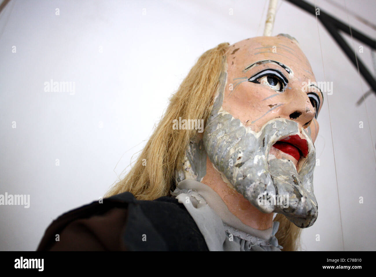 Close of of a large old male Sicilian marionette / puppet with beard ...