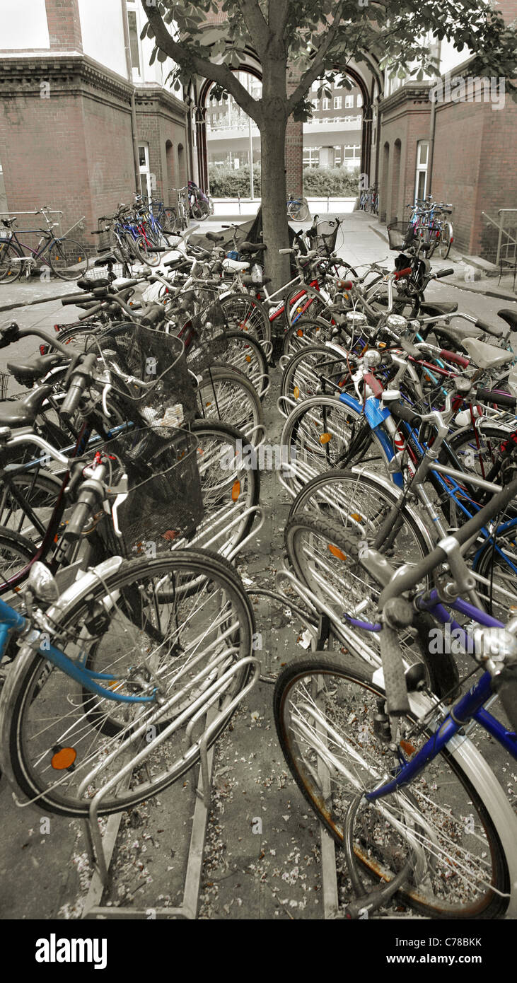 Bicycle parking in a house court yard. Hamburg. The picture is slightly ...