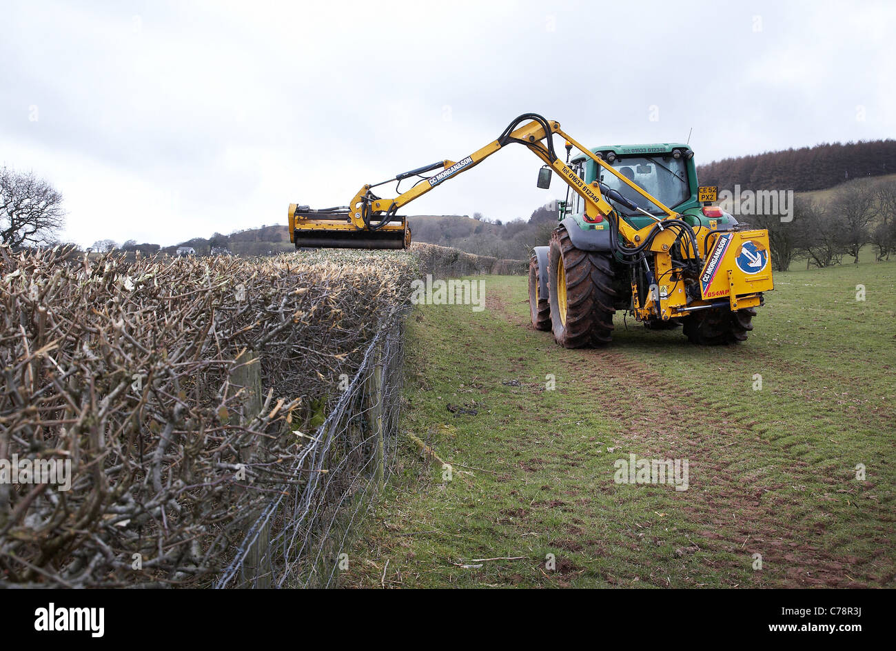 Tractor cutting hedges hi-res stock photography and images - Alamy