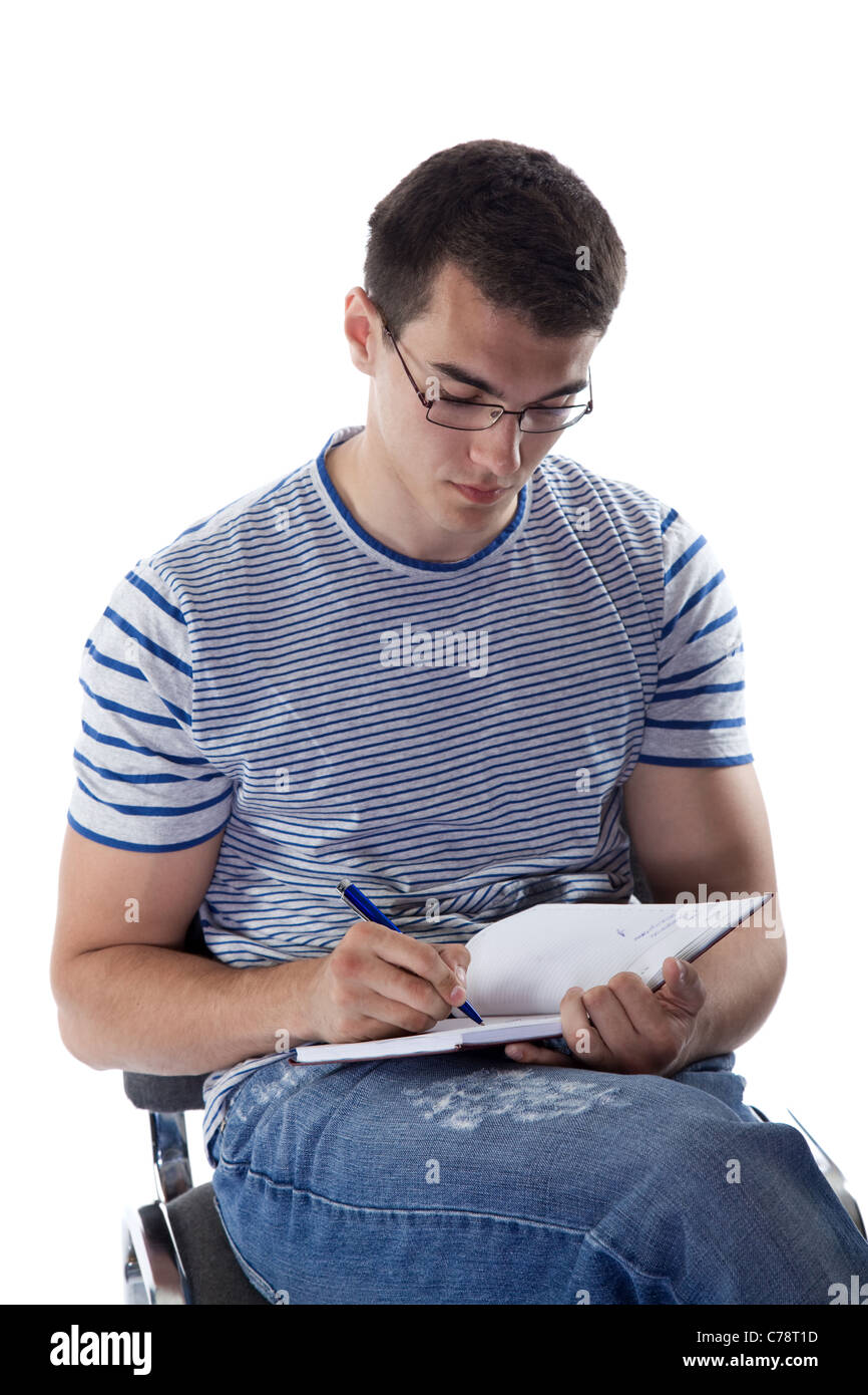 Student with a notebook sits on a chair isolated a white background ...