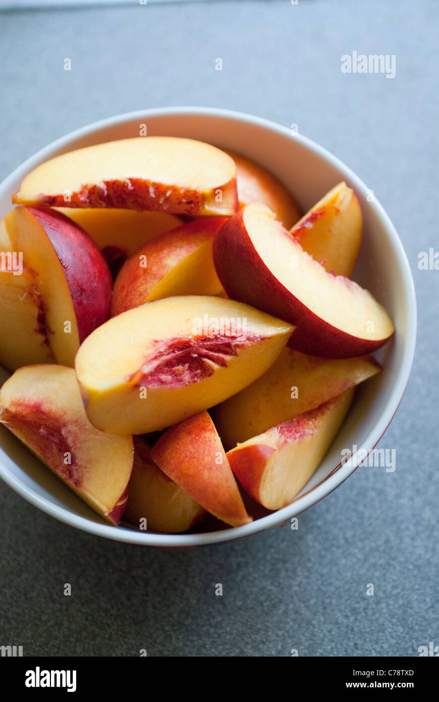 Bowl Of Sliced Peaches
