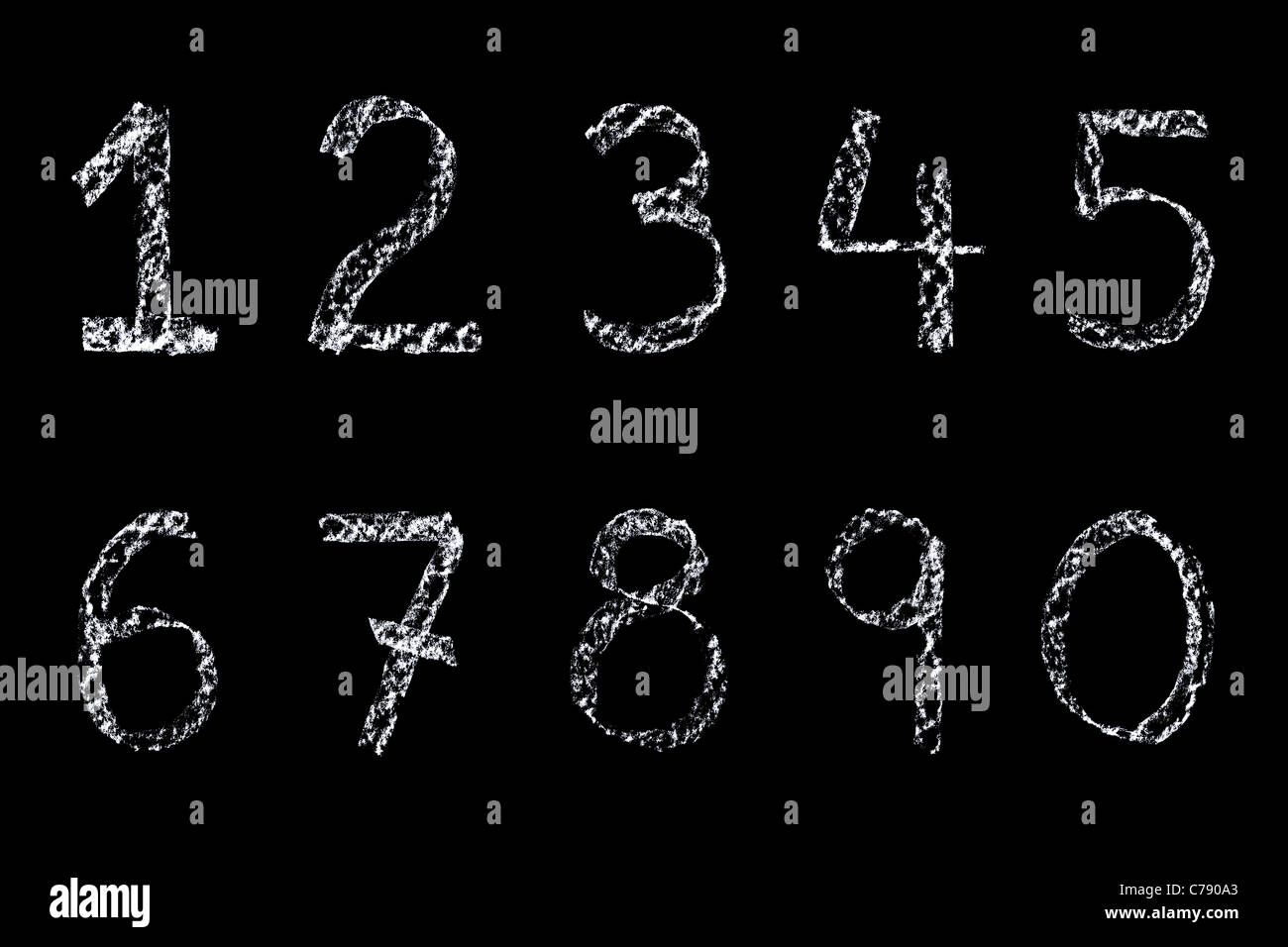 Handwritten numbers written on a blackboard in white chalk then cleaned ...