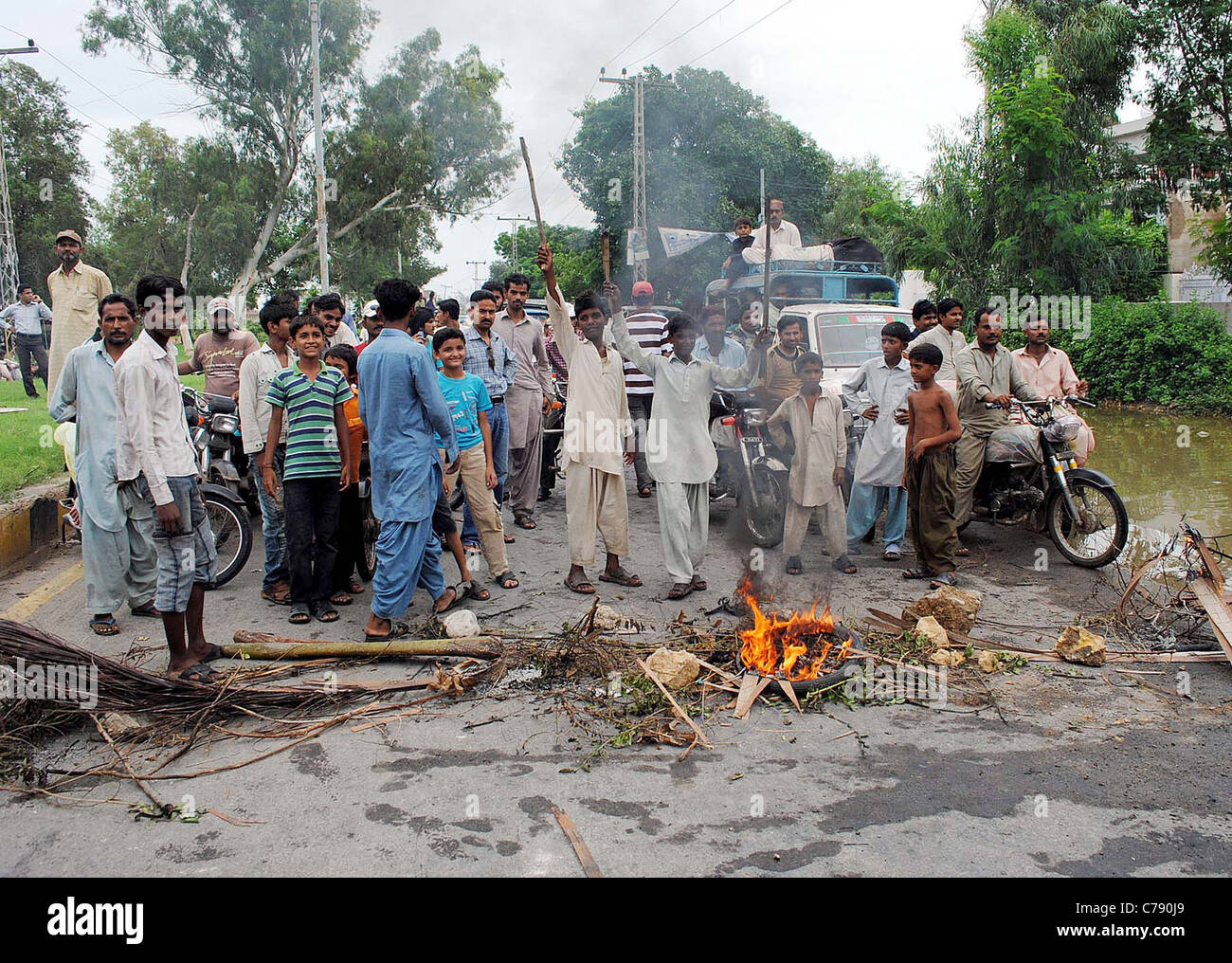 Angry protesters burn woods at a road during protest demonstration of ...