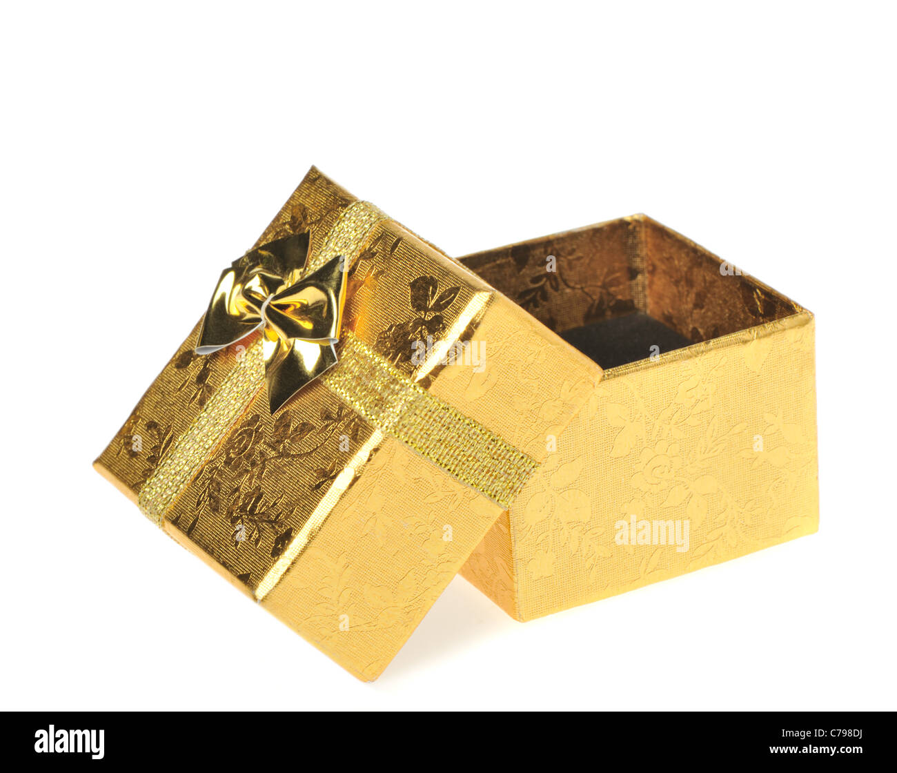 Gift box. Gold color. It is isolated on a white background Stock Photo ...