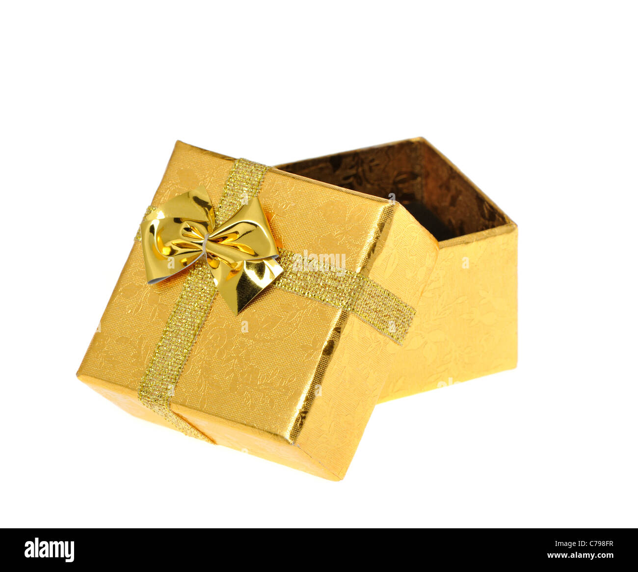 Gift box. Gold color. It is isolated on a white background Stock Photo ...