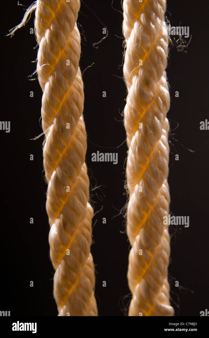 two ropes on a black background Stock Photo - Alamy