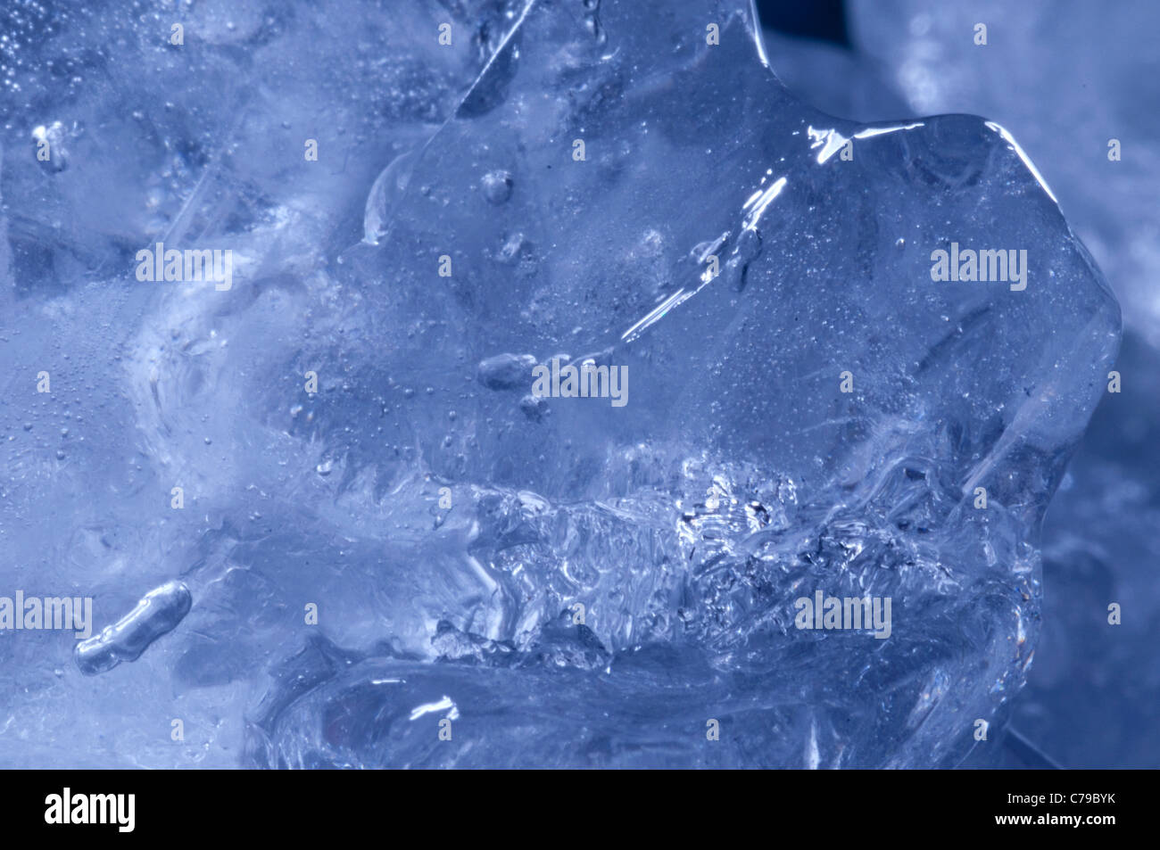 a piece of ice close up on black background Stock Photo - Alamy