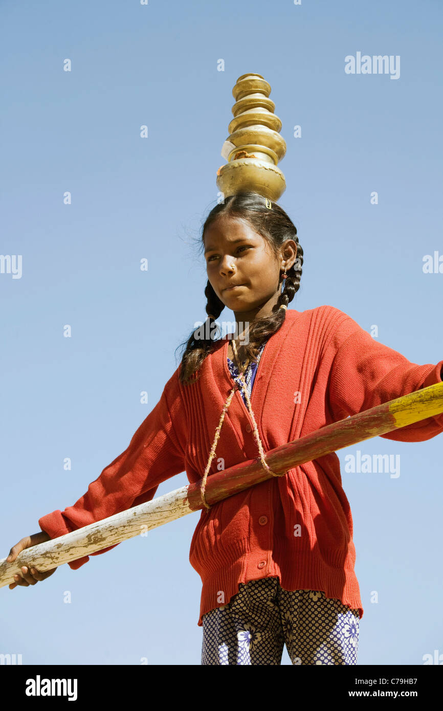 A child acrobat performs at the Fort Gate entrance to Jaisalmer Fort ...