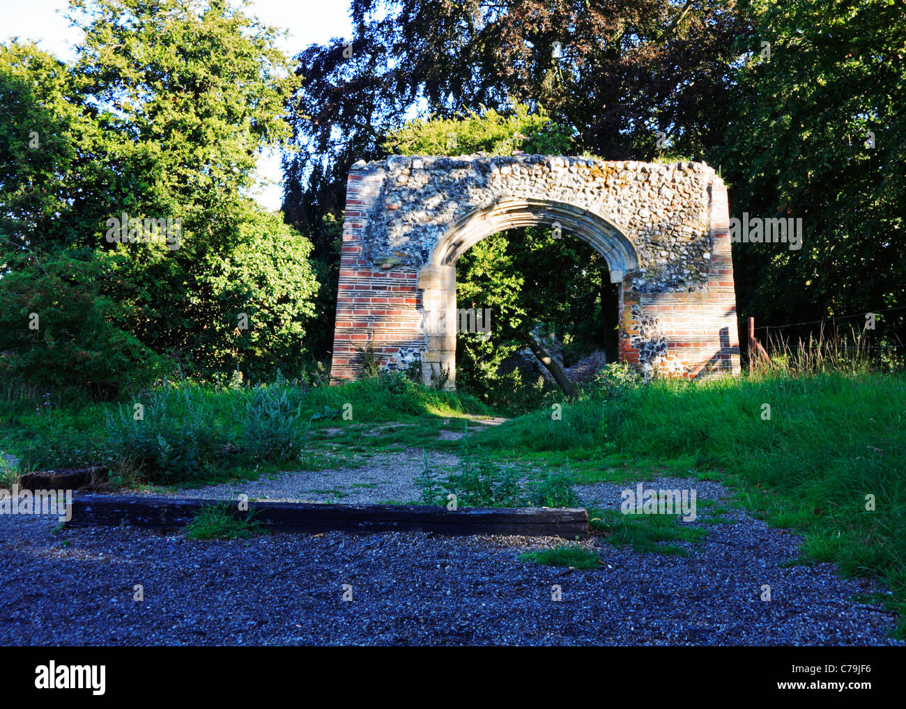 The archway at the entrance to the ruins of Trowse Newton Hall at ...
