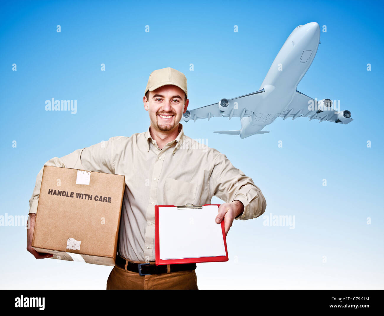 caucasian delivery man and airplane Stock Photo - Alamy