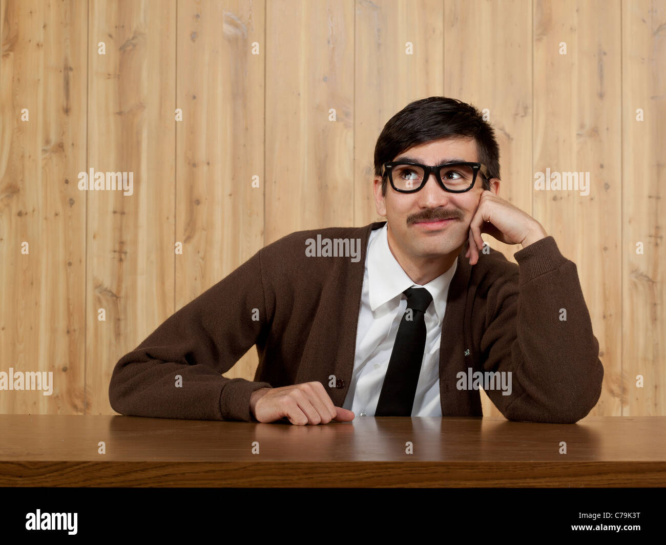 Bored businessman at desk in office Stock Photo - Alamy