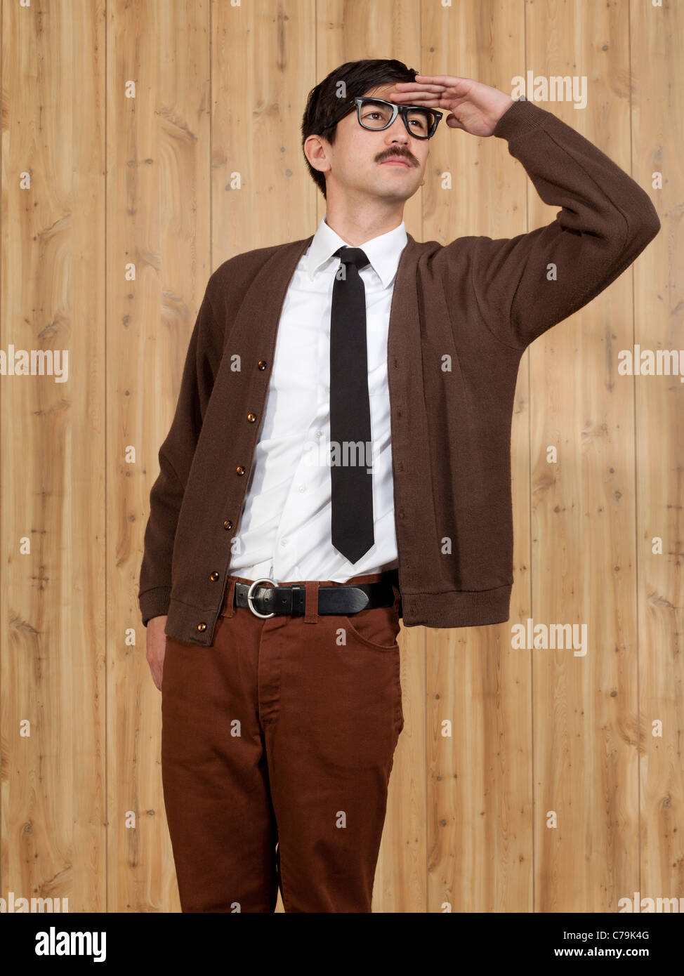 Successful businessman saluting in office Stock Photo - Alamy