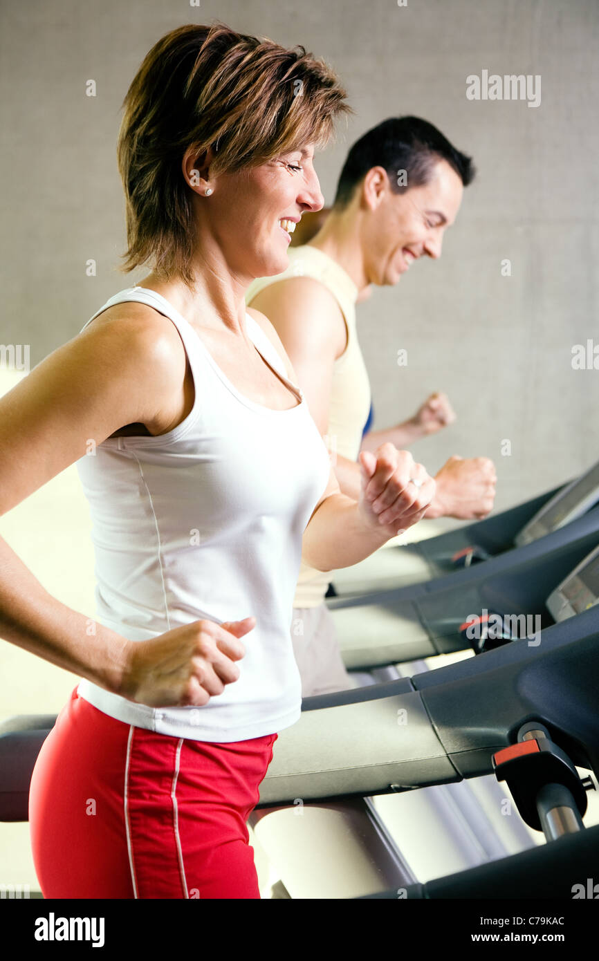 Gym and women walking on treadmill hi-res stock photography and images ...
