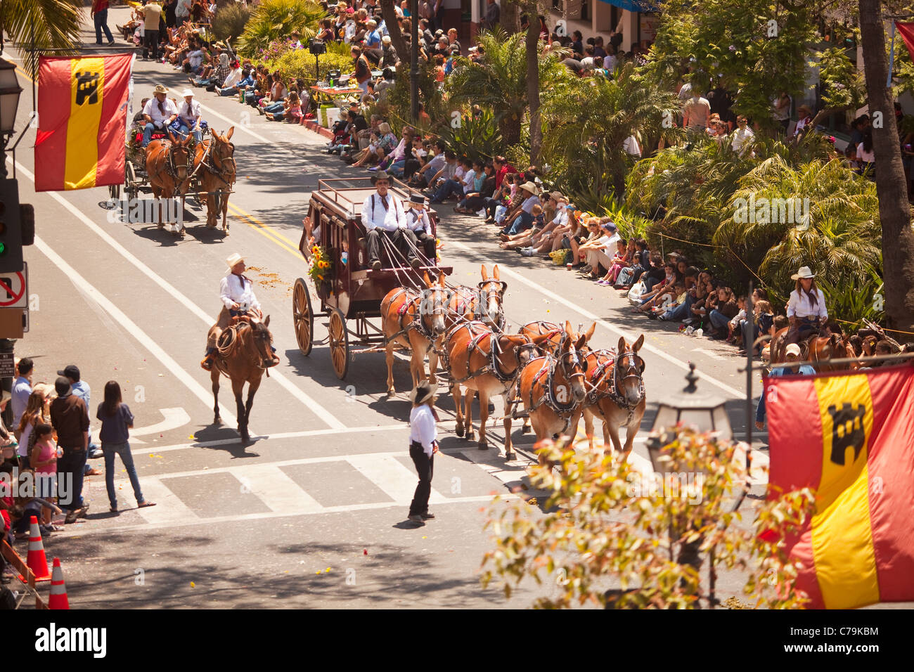 stagecoach and horseback riders participate in the opening day parade ...