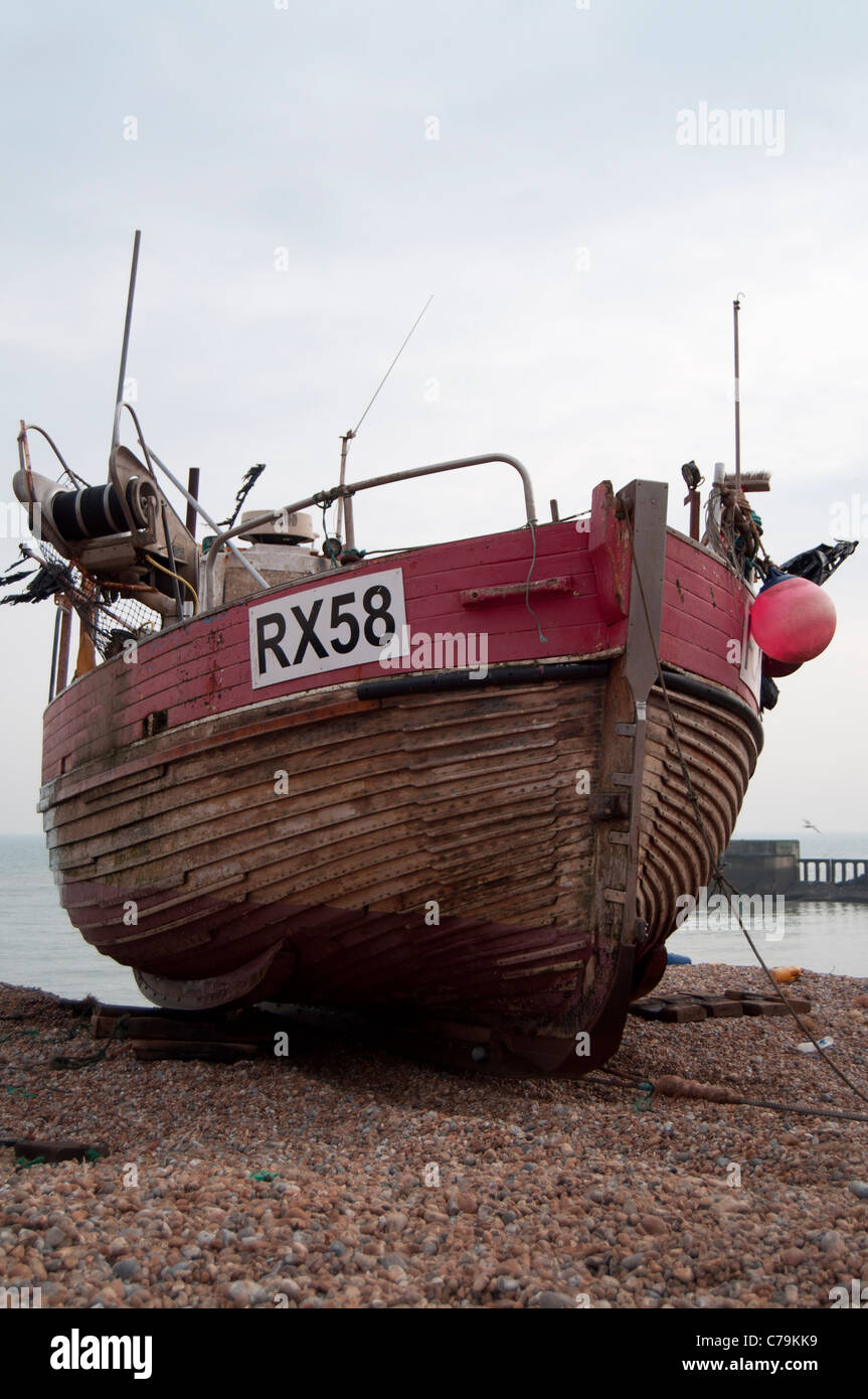 Fishing boat, hauled up on hastings beach, England UK Stock Photo - Alamy
