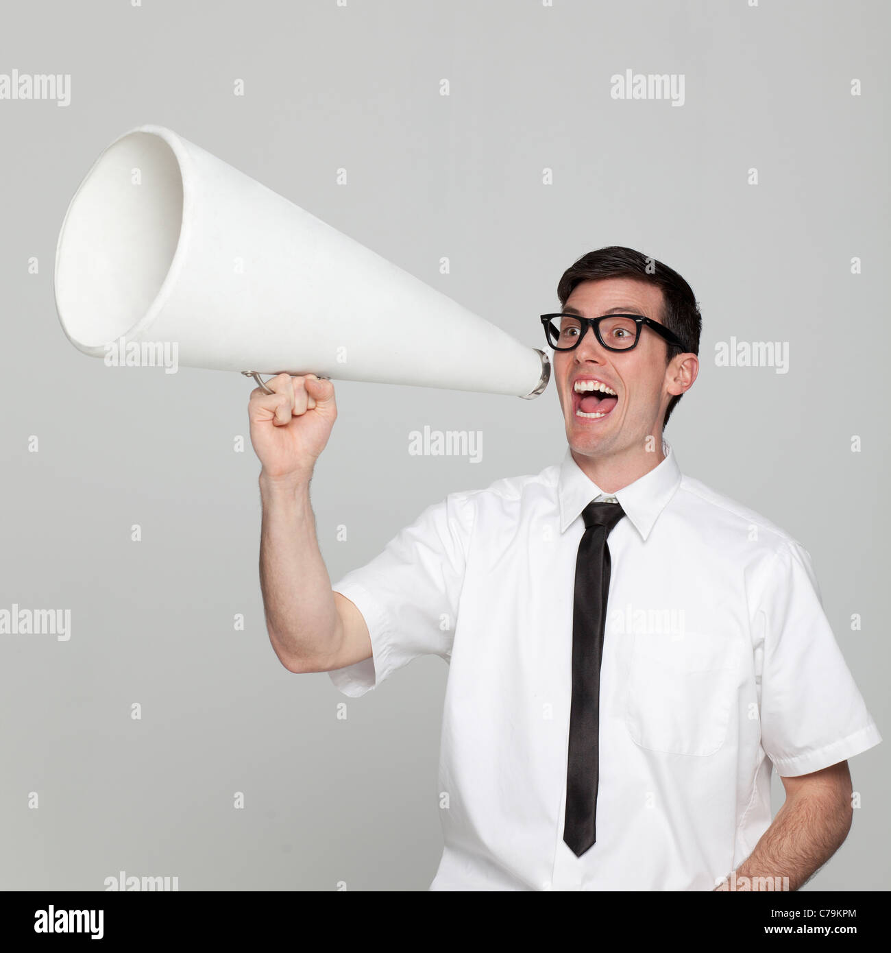 Black man holding megaphone hi-res stock photography and images - Alamy