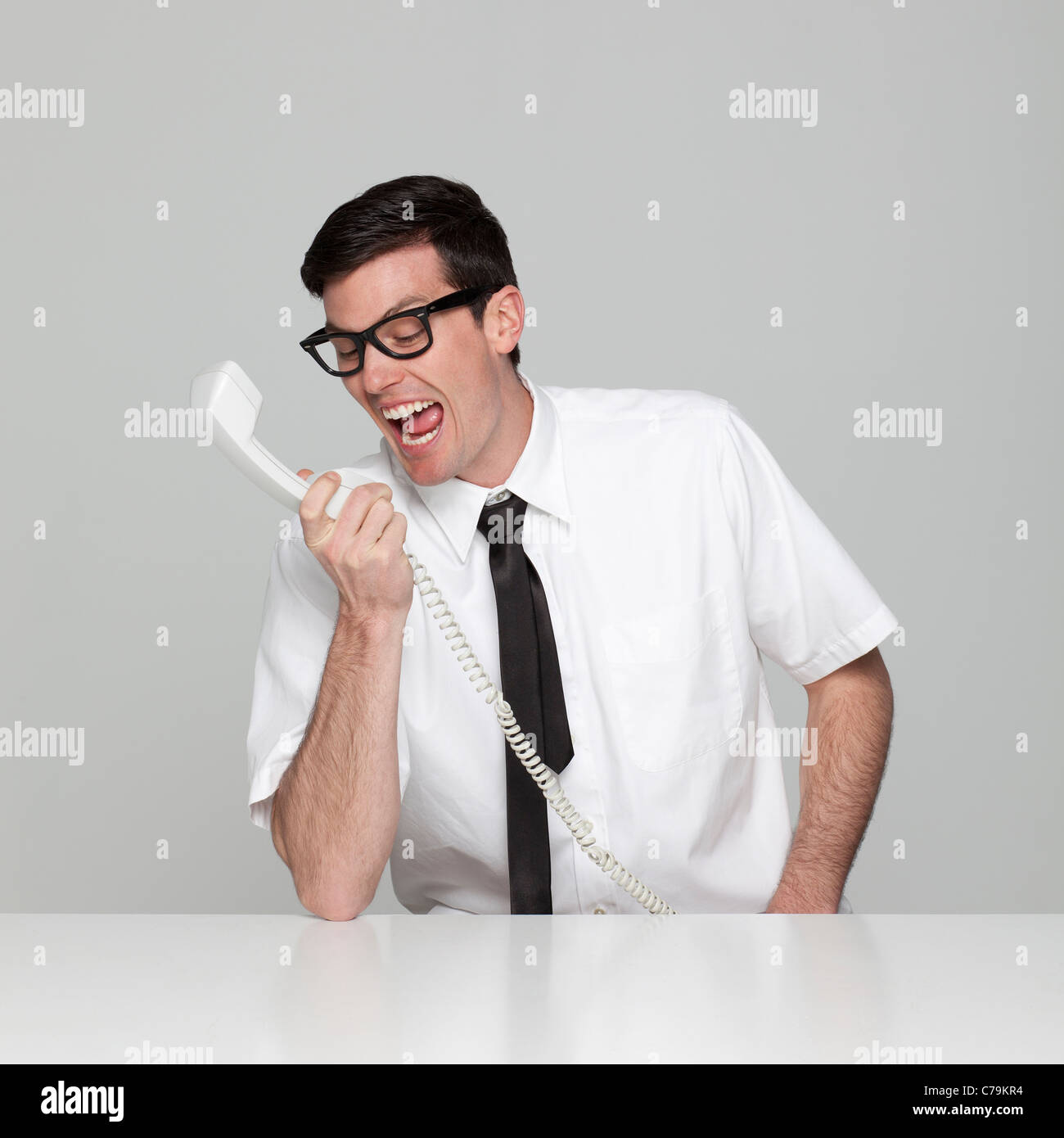 Standing holding shouting mouth open spectacles hi-res stock ...