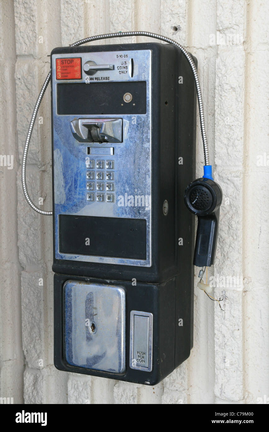 public USA pay telephone with broken handset Stock Photo - Alamy