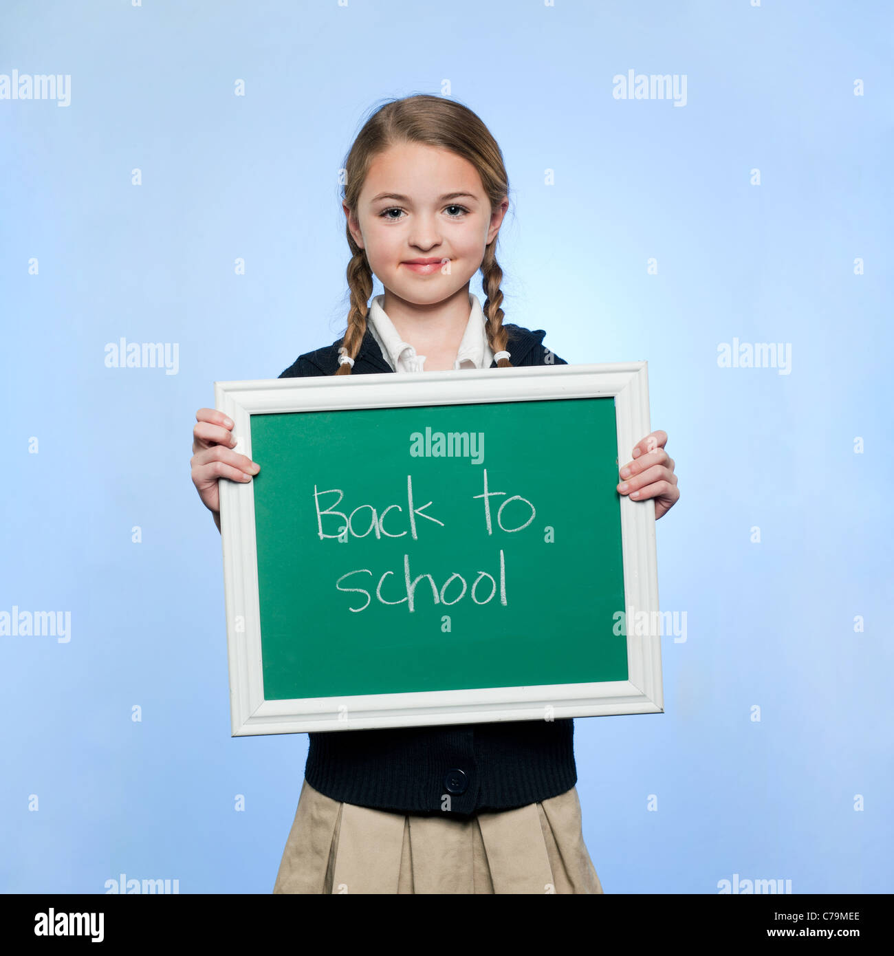 School girl back view uniform hi-res stock photography and images - Alamy