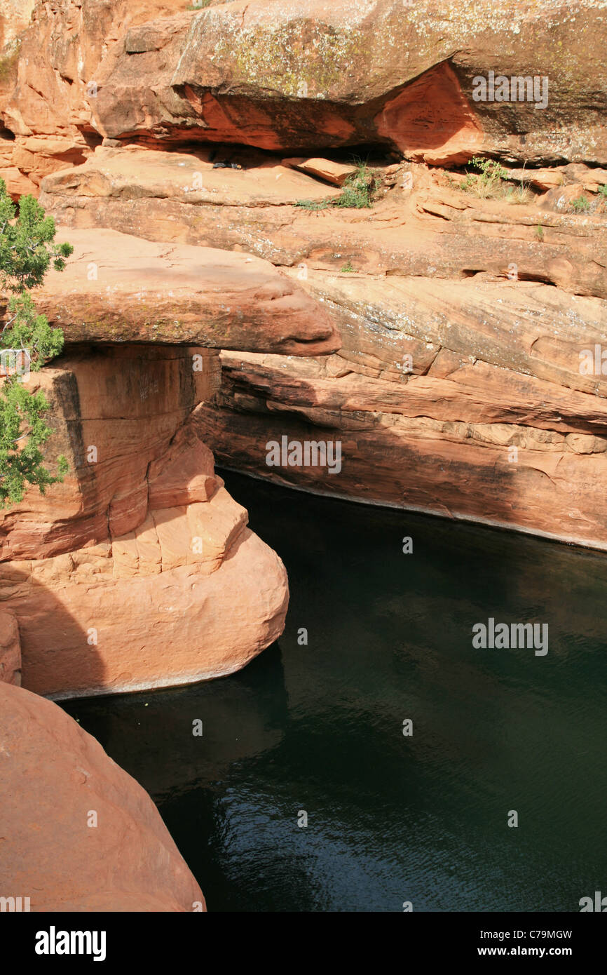 red rock swimming hole in Arizona with jumping rock Stock Photo - Alamy