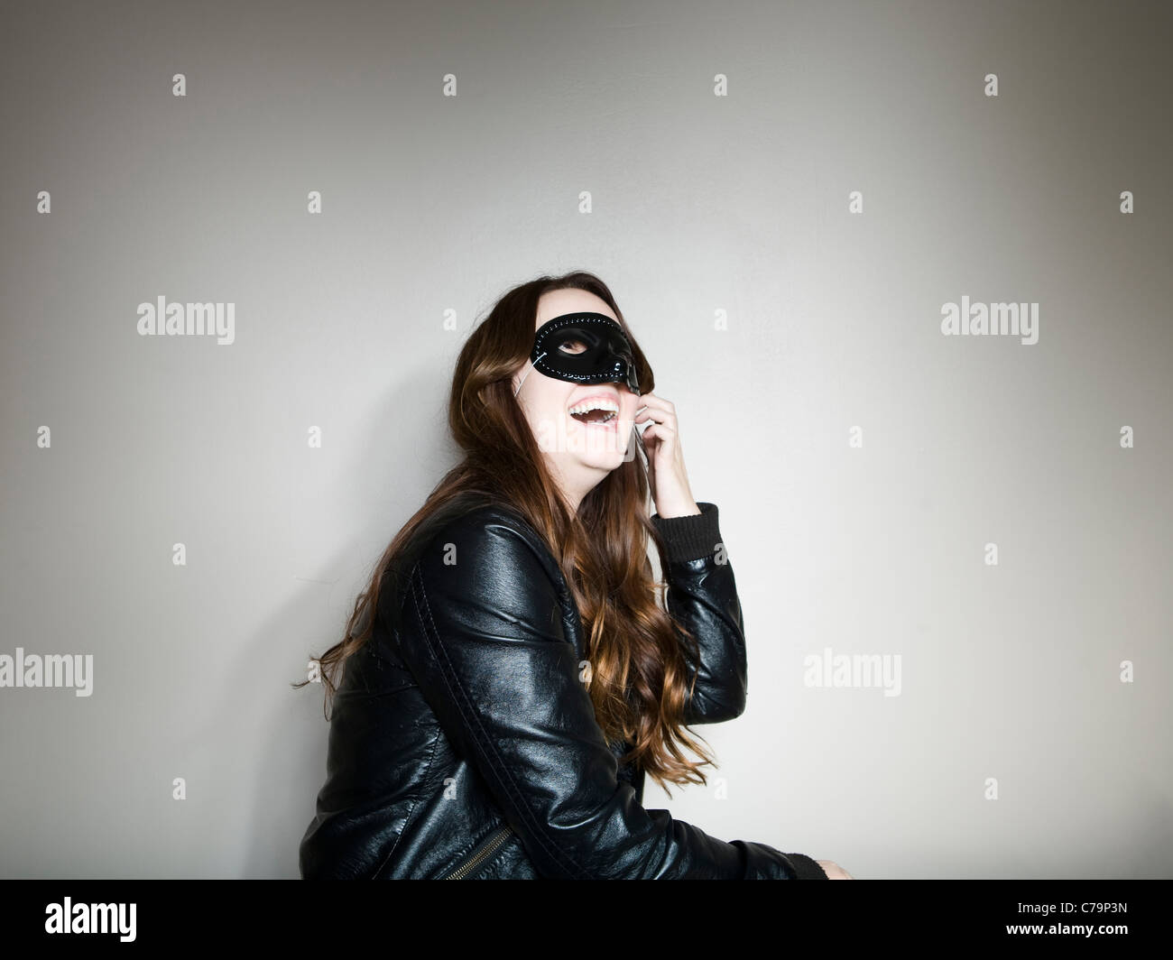 Woman wearing leather mask hi-res stock photography and images - Alamy