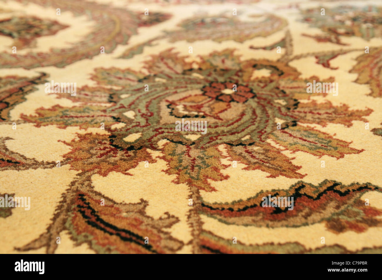 angled view of beige oriental carpet with shallow depth of field Stock ...