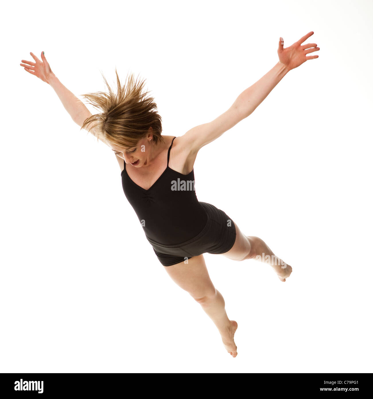 Woman falling against white background Stock Photo - Alamy