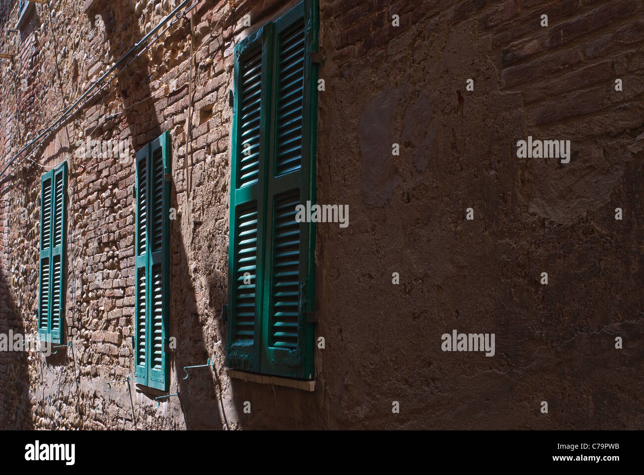 Architectural detail looking at the side of an old brick building with ...