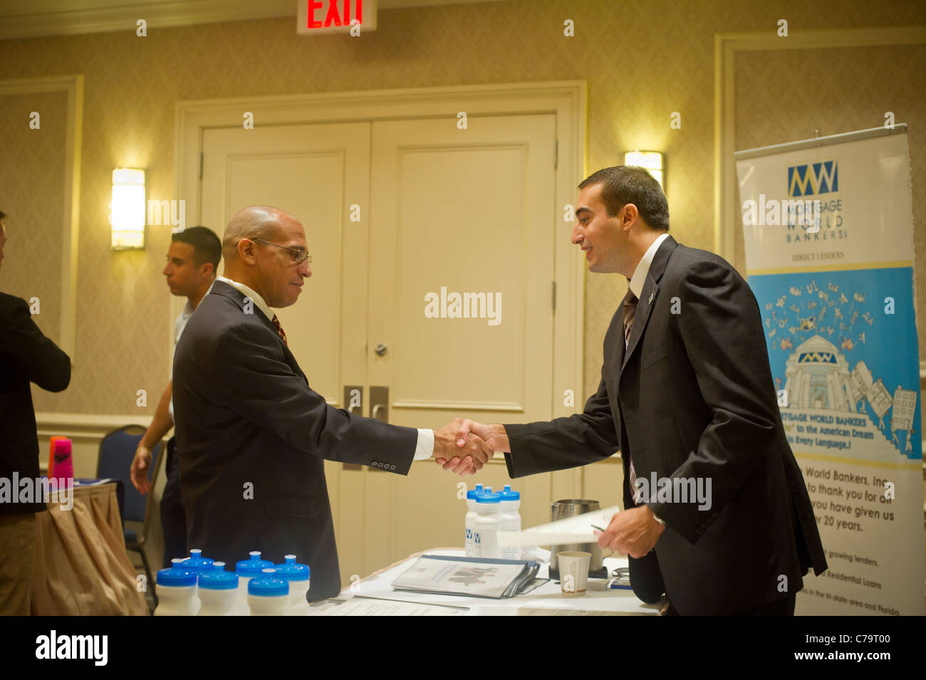 Job seekers attend a job fair in midtown in New York on Thursday ...