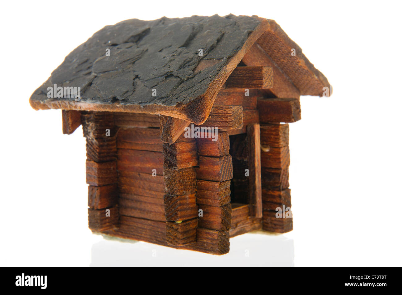 Miniature wooden cabin isolated over white background Stock Photo - Alamy