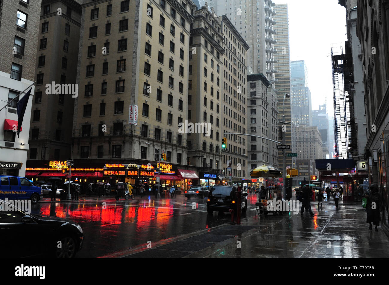 Rainy street view, looking south, wet tarmac 7th Avenue 55th Street ...