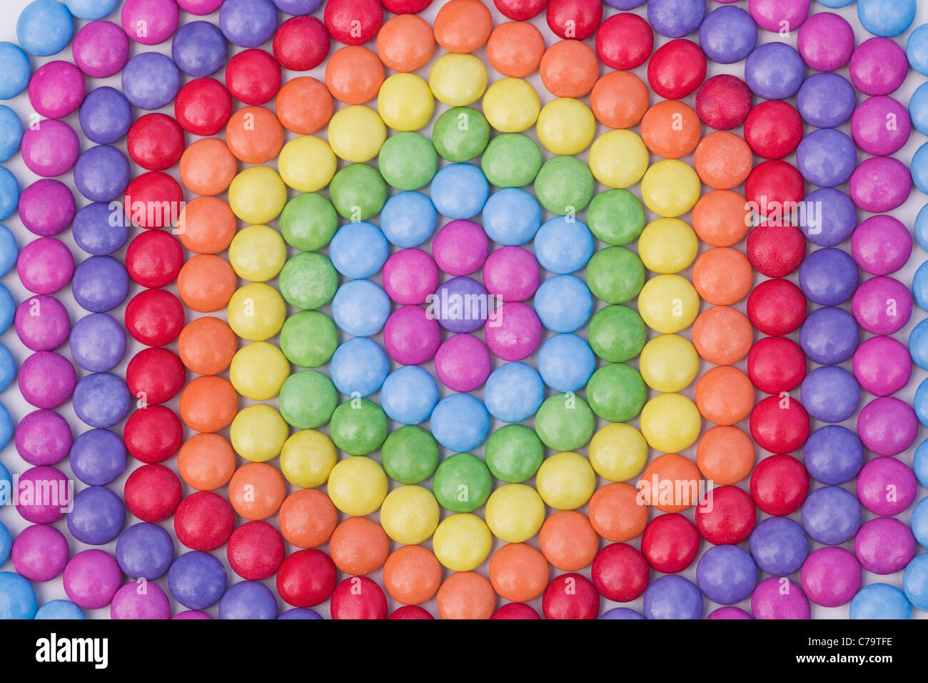 Hexagon shaped smartie pattern. Close up Stock Photo - Alamy