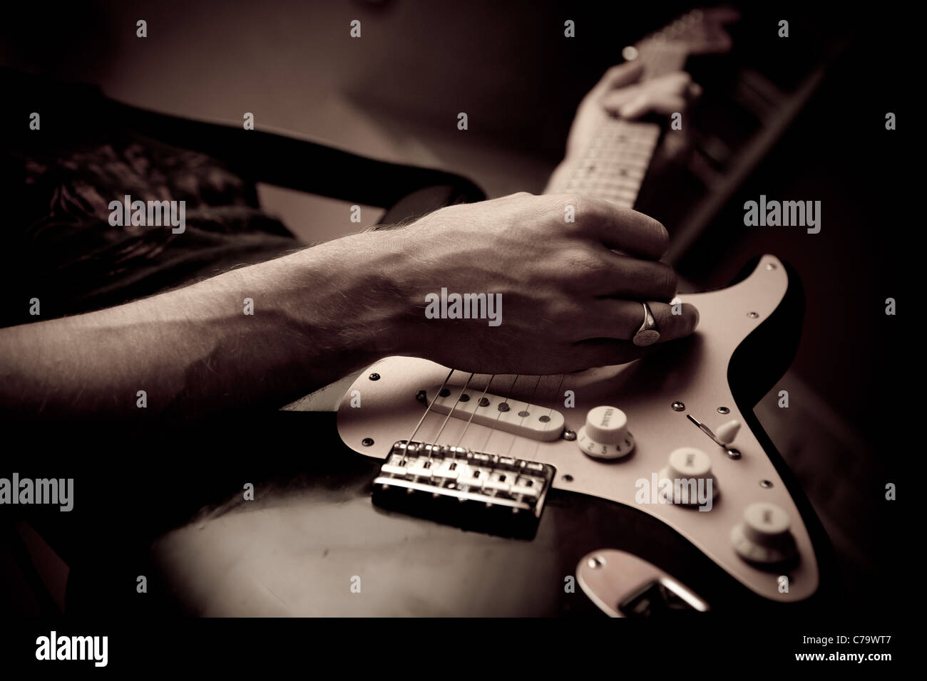 Man playing electric guitar Stock Photo - Alamy